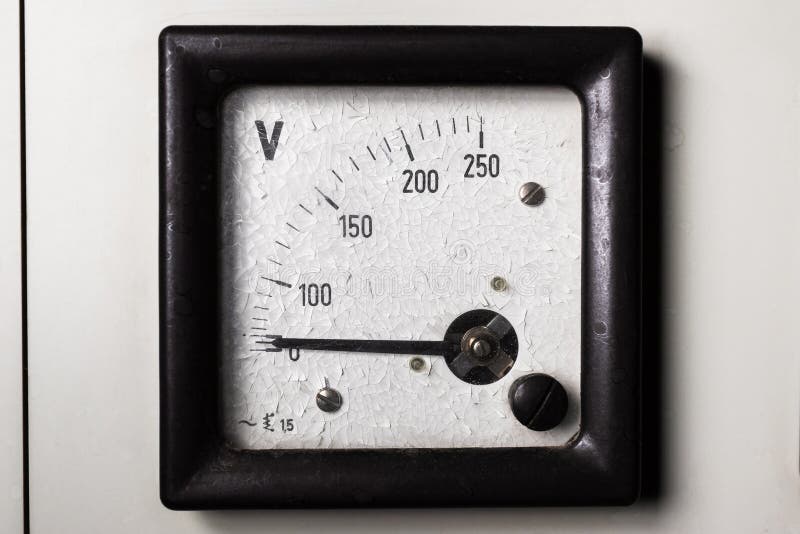 Old Analog Voltmeter with an Arrow and Cracked Paint on a Scale with ...