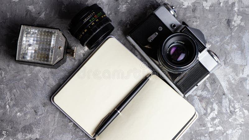 Old Analogue Camera and Notepad. a Clean Notebook with a Fountain Pen ...