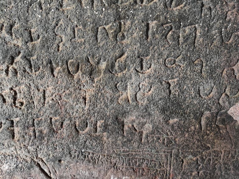 Old Ancient Scriptures Written in Brahmi Script on Stone Wall in ...