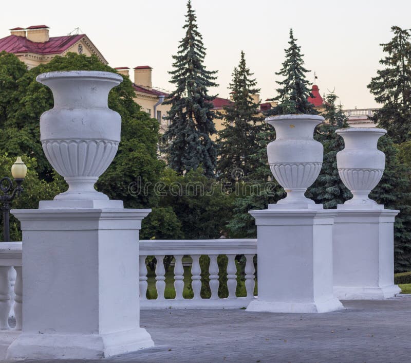 Old, Ancient Type Columns in Shape of Vases Placed Outdoors. Concept ...