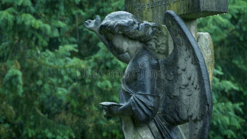 Old Angel Statue in the Rain Outdoors Stock Footage - Video of cemetery ...