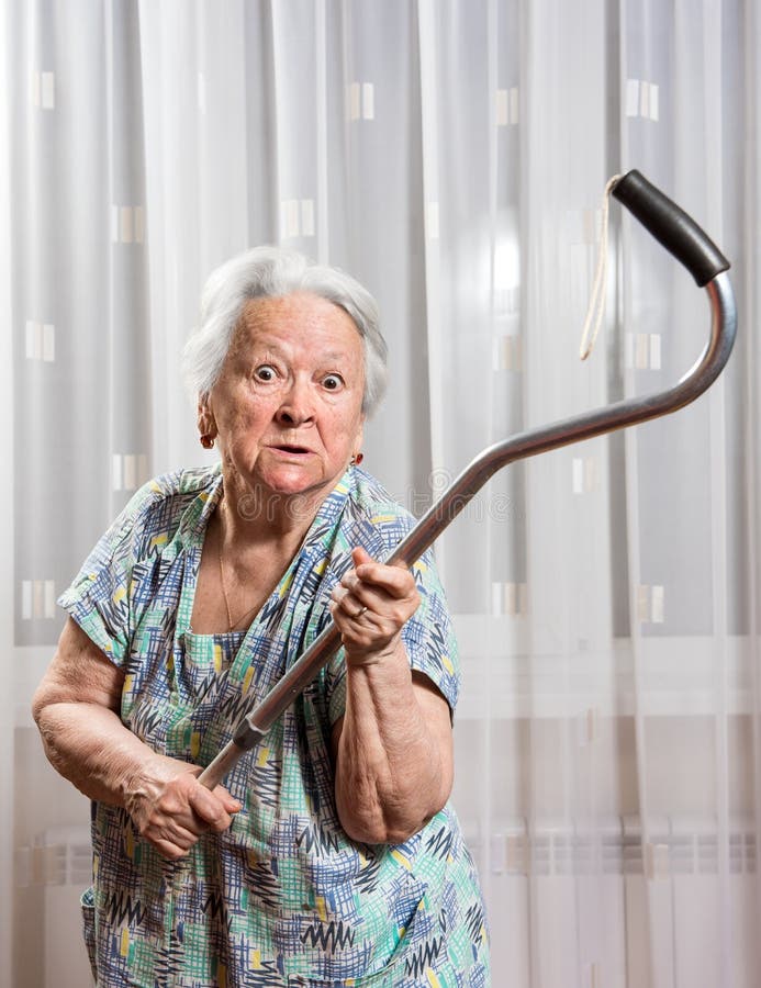 Old Angry Woman Threatening with a Cane Stock Image - Image of ...