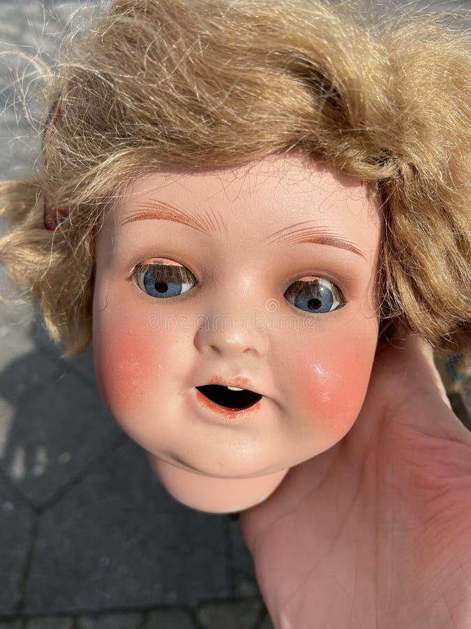 Old antique doll head stock image. Image of hairstyle - 274624801