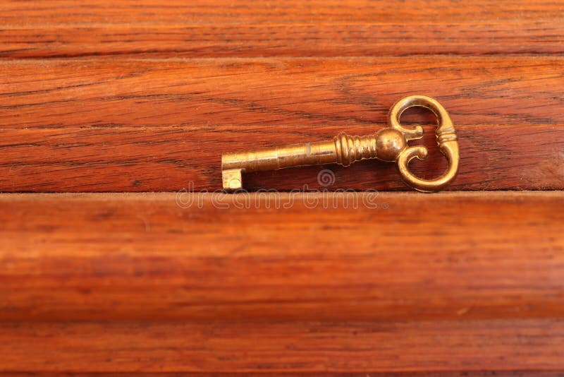 Old, Antique Key for a Grandfather Clock on Wood Stock Image - Image of ...