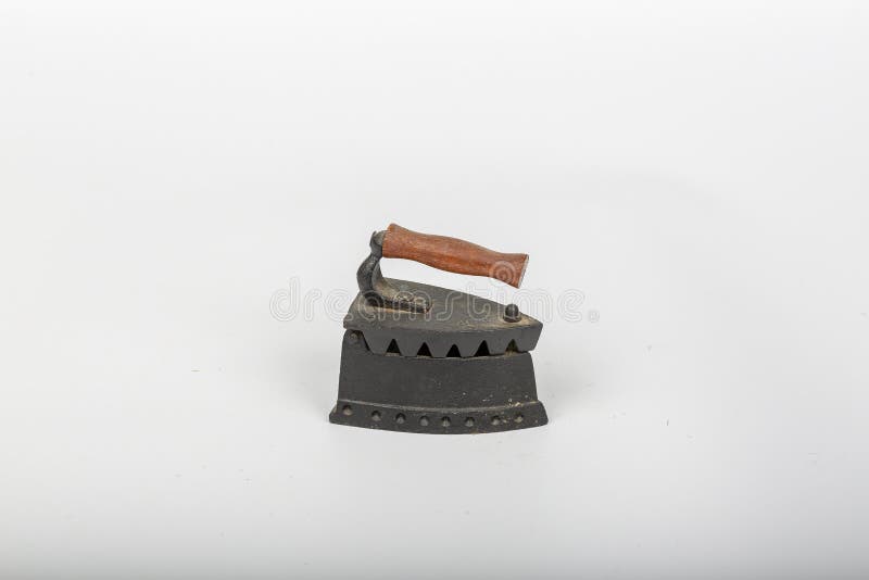 Old and Antique Metal Iron with a Wooden Handle Stock Image - Image of ...