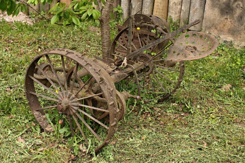 An Old Antique Mower in the Garden Now Serves As an Exhibit Stock Photo ...