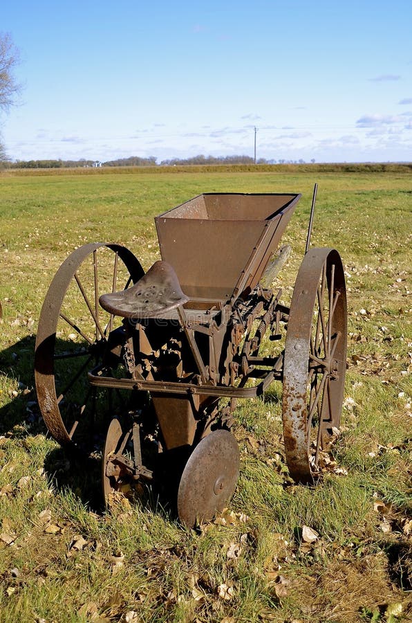 Old Antique Rusty Potato Planter Stock Photo - Image of faming, spud ...
