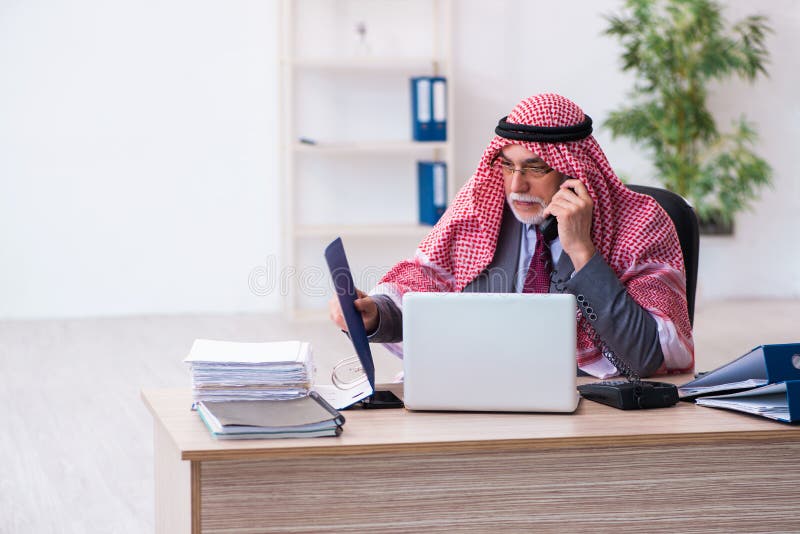 Male Arab Bookkeeper Extremely Tired with an Excessive Work Stock Image ...