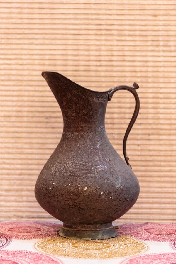 Old Arabic metal pitcher stock image. Image of arabic - 174334765
