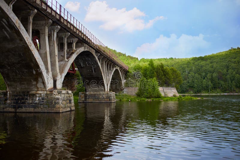Old Arch Bridge Over the River on a Summer Day Stock Photo - Image of ...