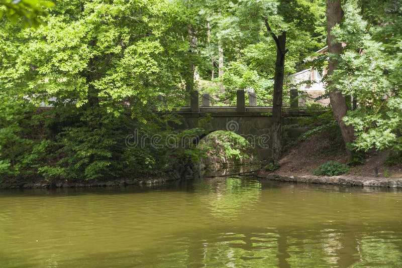 Old Arched Brick Bridge Over a Pond in the Sofievka Arboretum, Uman ...