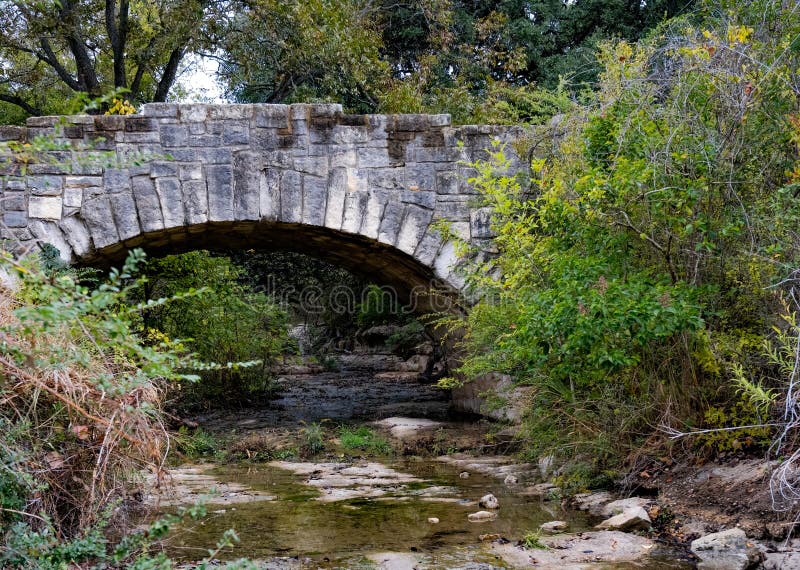 Old Arched Foot Bridge Over Creek, in Blanco, TX Stock Image - Image of ...