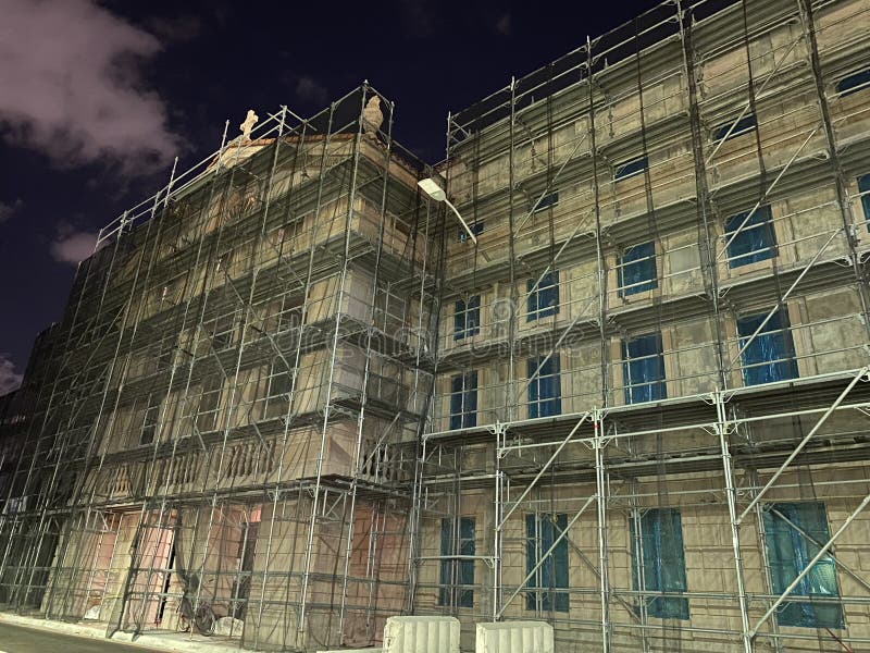 Old Architecture with Scaffolding for Renovation Shot at Night Stock ...