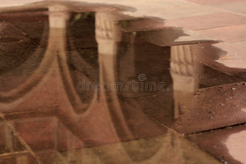 Old Archotecture Reflected in a Puddle Stock Image - Image of maius ...