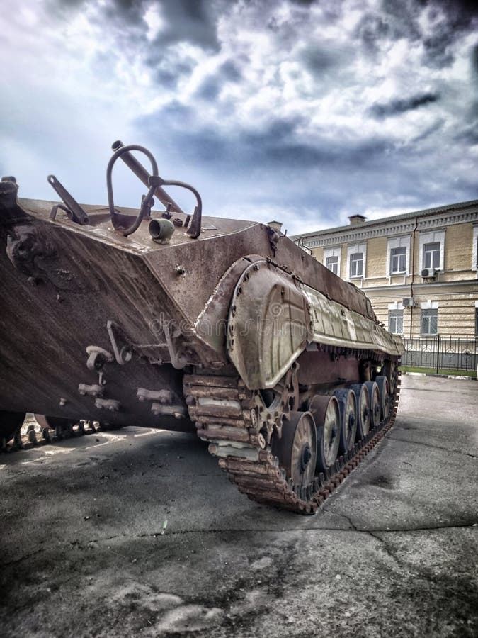 Old Army Tank Standing in a Town Square Stock Photo - Image of angle ...