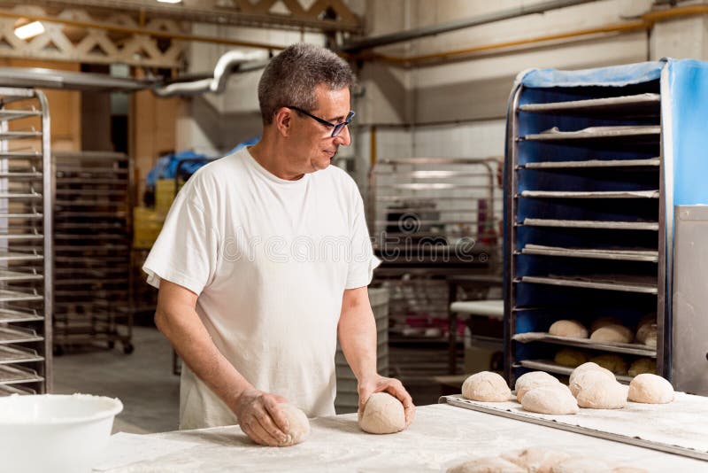 Old Authentic Baker in Bakery Making Organic Bread and Taking Care of ...