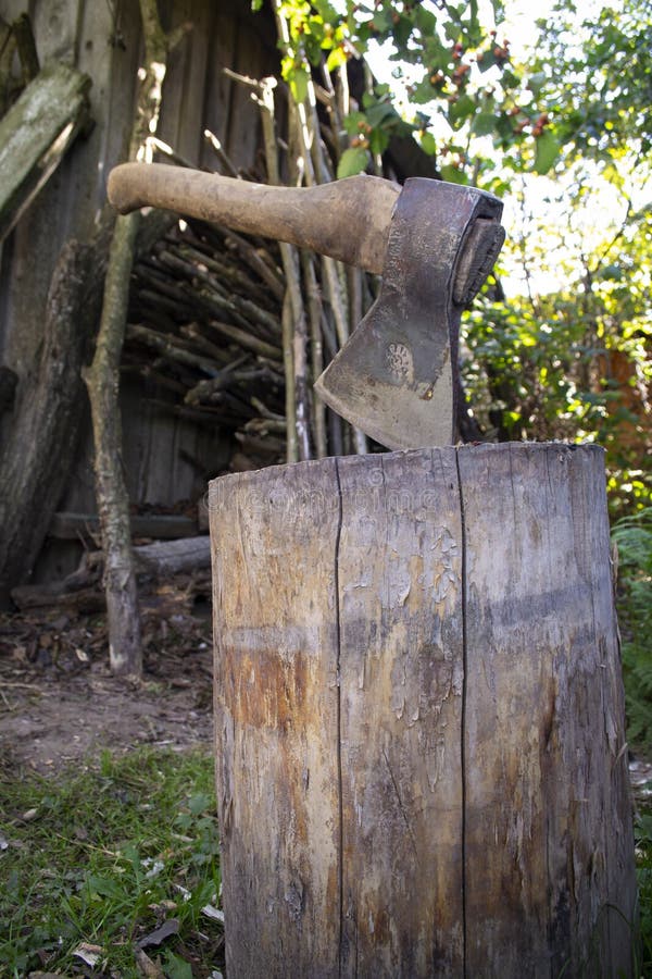 The Old Axe in the Chopping Block, in the Stumb Stock Photo - Image of ...