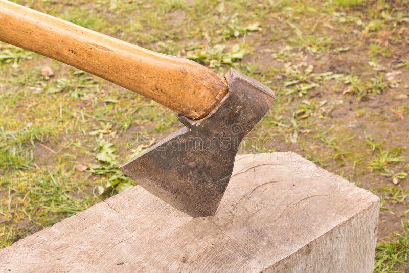 An Old Axe in an Oak Log. Close Up Stock Image - Image of hatchet ...