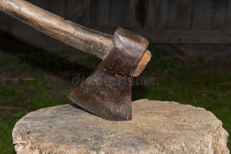 Old Axe on a Tree Stump for Chopping Firewood. Stock Photo - Image of ...