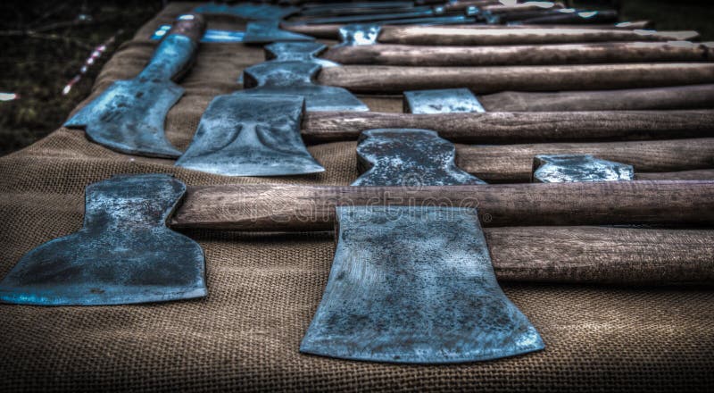 Old axes on a cloth stock photo. Image of cutting, tree - 186271744
