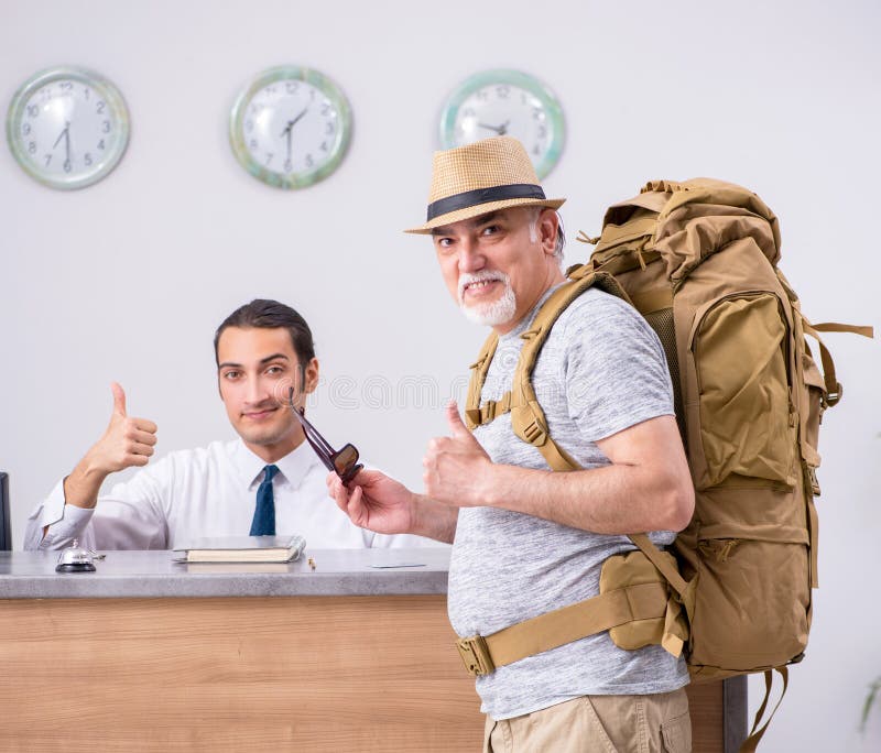 Backpacker at the Hotel Reception Stock Image - Image of business ...