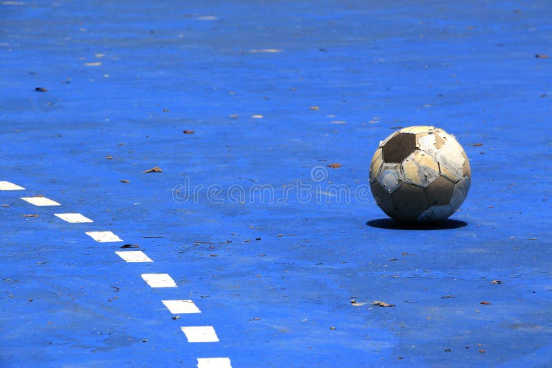 An Old Ball in a Blue Cement Field Stock Photo - Image of kick, outdoor ...