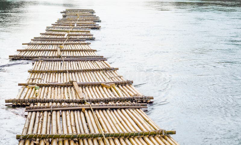 Old Bamboo Raft is Floating on the River in the Thailand Stock Photo ...