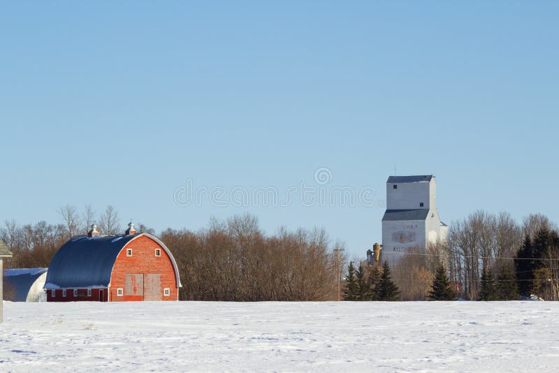 Old Barn beside an Elevator Stock Photo - Image of arched, painted ...