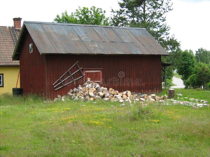Old Barn with a Stack of Firewood Stock Image - Image of falu, barn ...