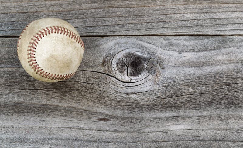 Old Baseball on Weathered Wood Stock Photo - Image of rustic, vintage ...