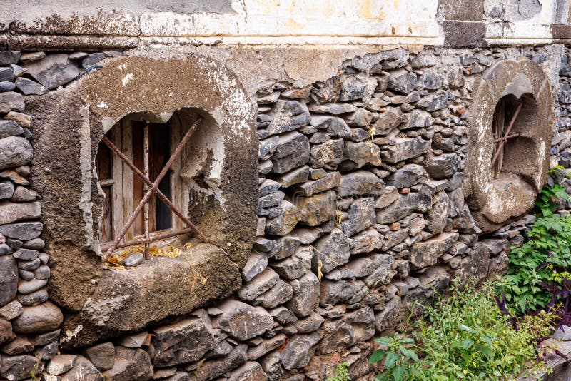 Old Basement Windows with Iron Bars on a Stone Wall. Old Walls Made of ...