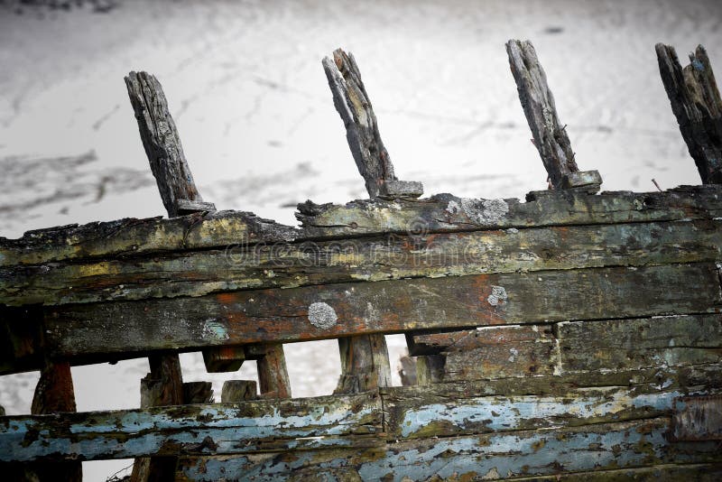 Ship Wreck of an Old Boat Washed Up on a Rocky Beach Stock Photo ...