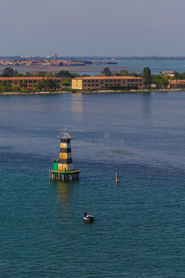 Old Beacon in Venice Canal stock photo. Image of marker - 106393226