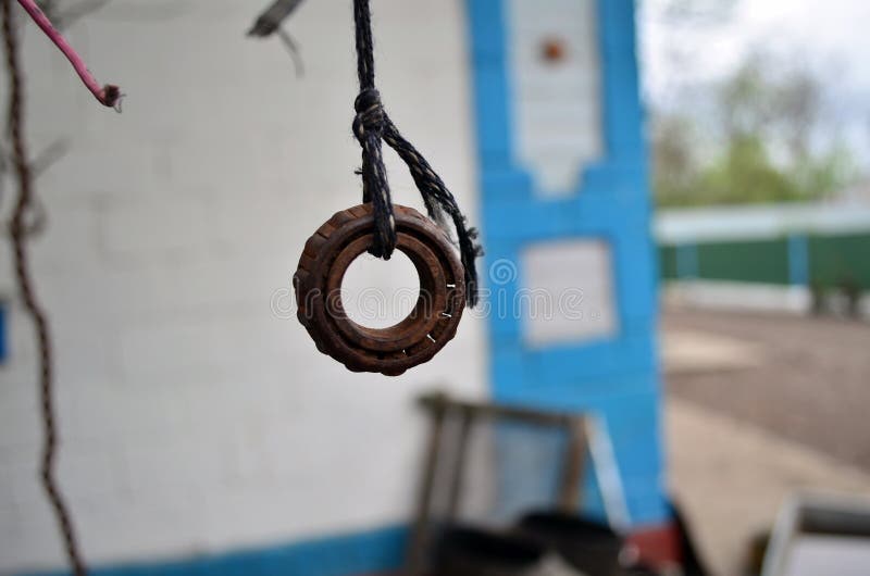 Old Bearing Hanging on a Rope Stock Photo - Image of industry ...