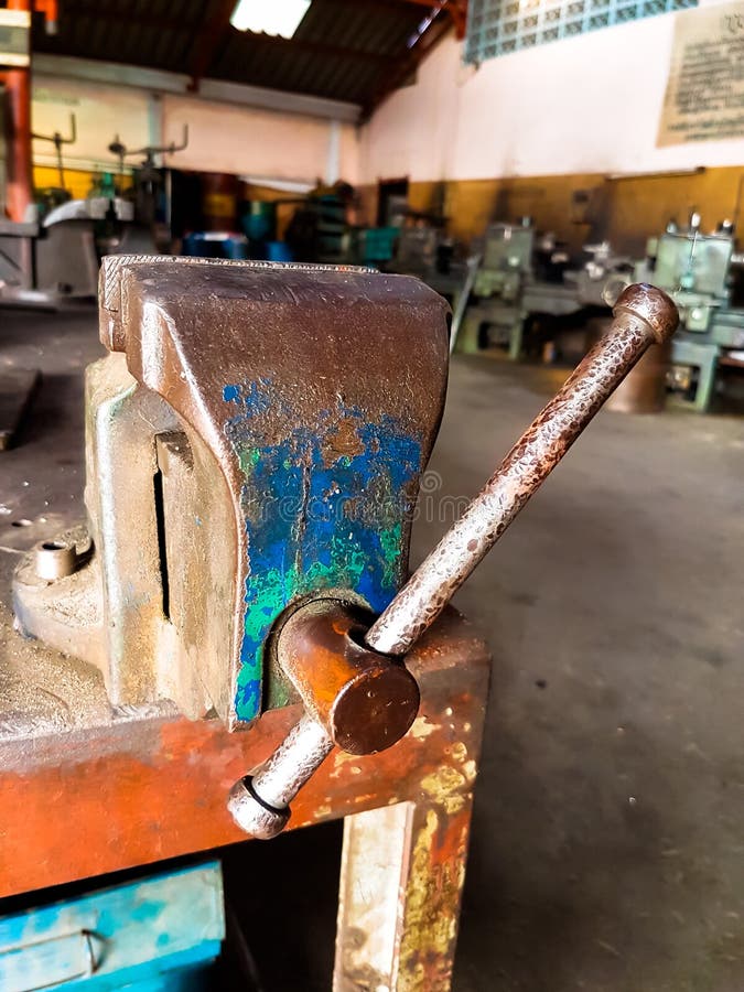 Old Bench Vise Hand Tool with Rust on Table Stock Image - Image of ...