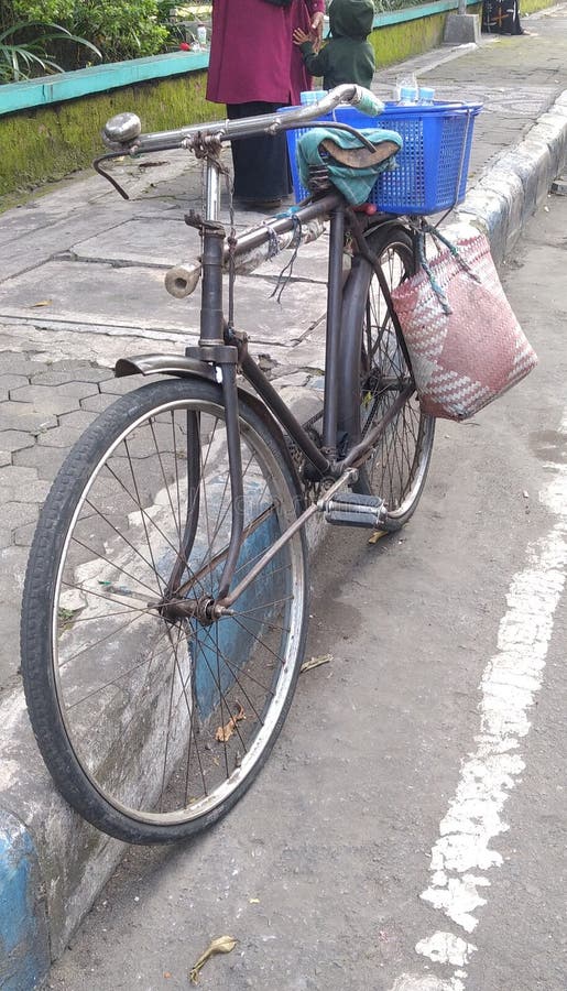 An Old Bicycle that is Still Used for Trading Activities. Stock Image ...
