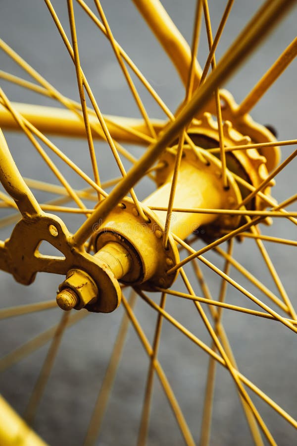 Old Bicycle Wheel Painted in Vibrant Yellow Color Stock Image - Image ...