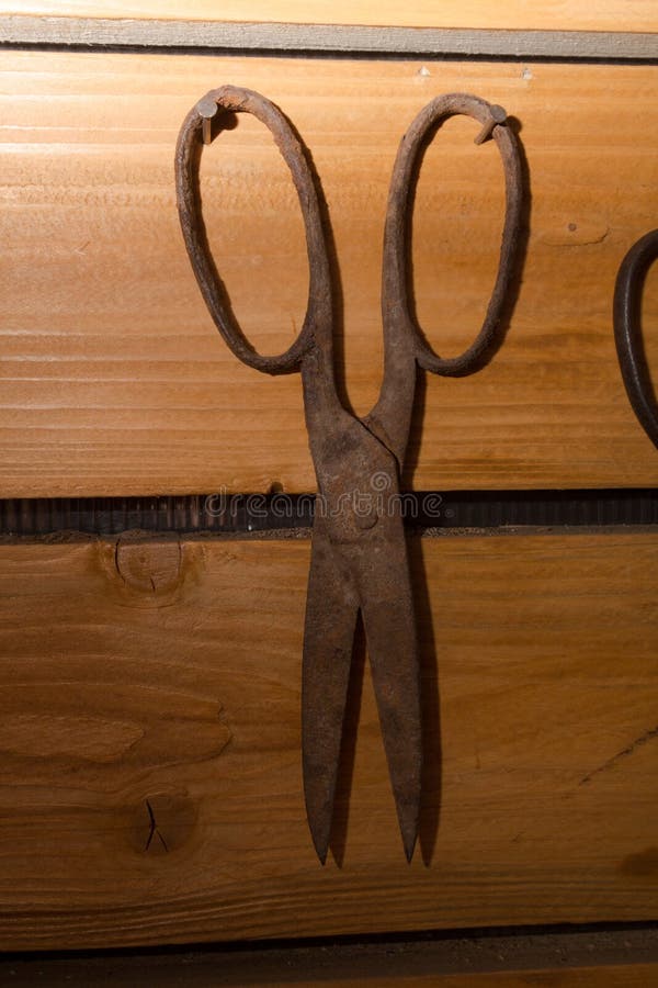 Old Rusty Scissors Made of Iron Stock Photo - Image of hanging, antique ...