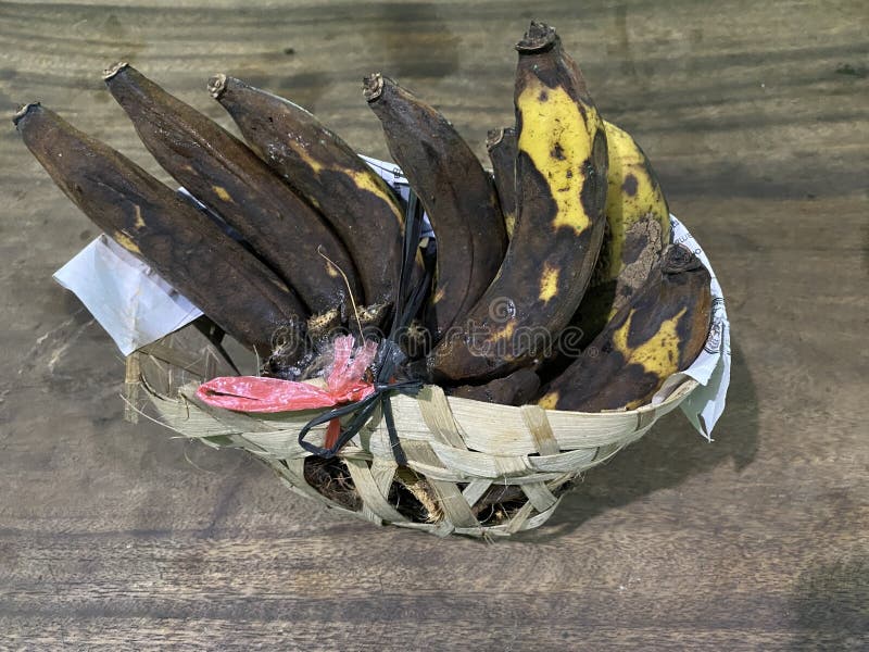 Old Black Old Banana on the Table Inside the Basket Stock Image - Image ...