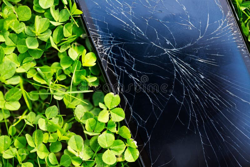 Old Black Cracked Touch Screen Phone, Broken Cellphone Stock Photo ...