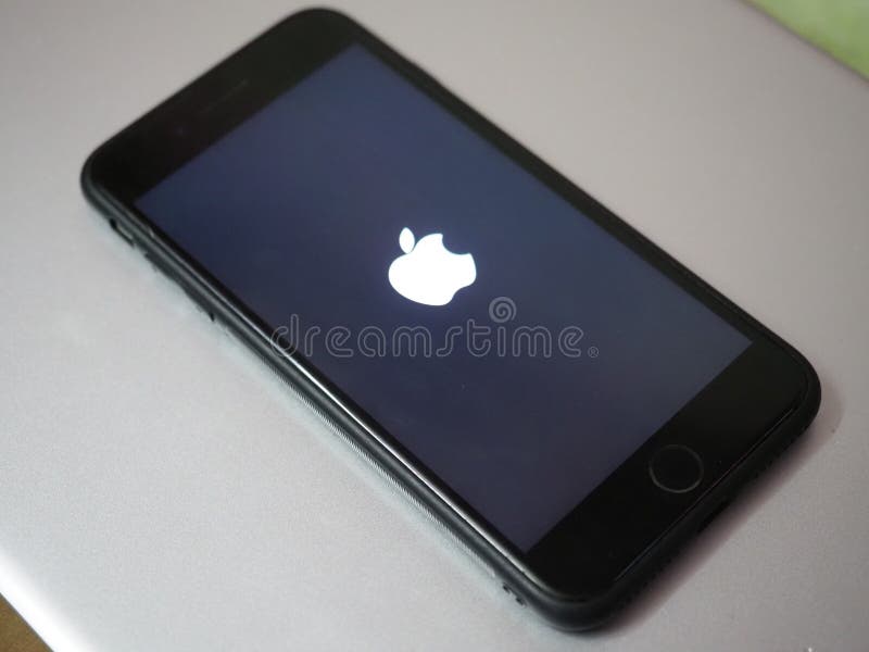 Old Black IPhone Smartphone is Being Loaded with Logo on the Screen ...