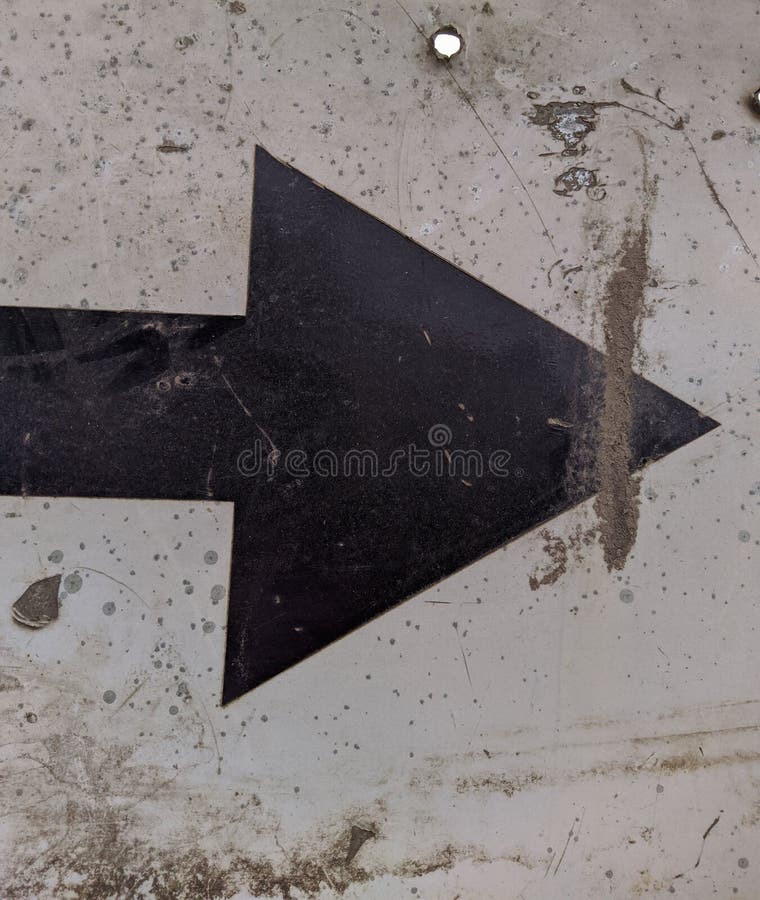 Old and Black Metal Arrow Sign Points To the Right Stock Image - Image ...