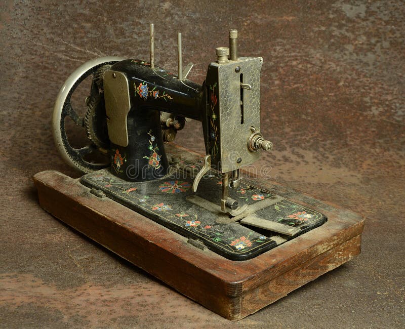 Old Black Sewing Machine on a Sheet of Rusty Iron. Stock Image - Image ...