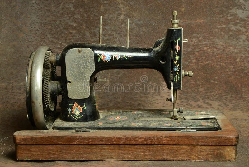 Old Black Sewing Machine on a Sheet of Rusty Iron. Stock Image - Image ...