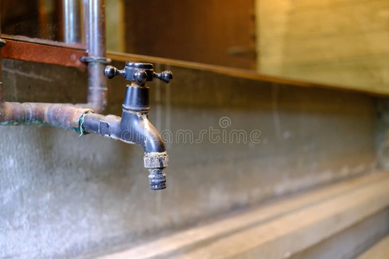 Old Black Tap in the Toilet. Stock Photo - Image of bath, clean: 261351458