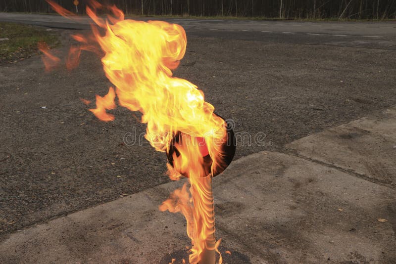 Vinyl Record Burns Bright Orange Flame on the Asphalt Stock Image ...