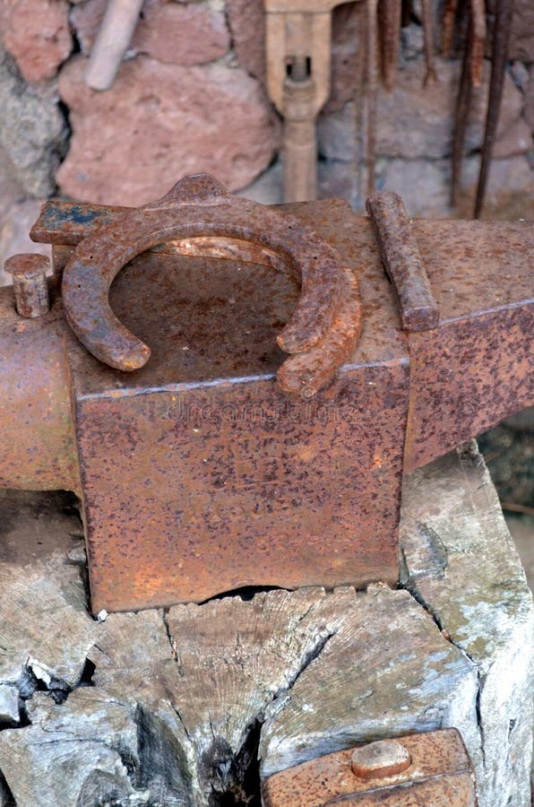 Old Blacksmith`s Anvil with Horseshoe Stock Photo - Image of equipment ...