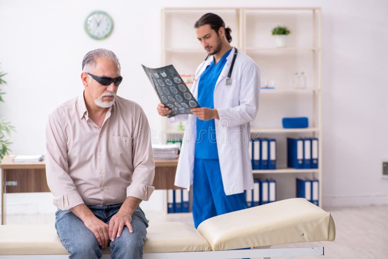 Old Blind Man Visiting Young Male Doctor Stock Image - Image of ...