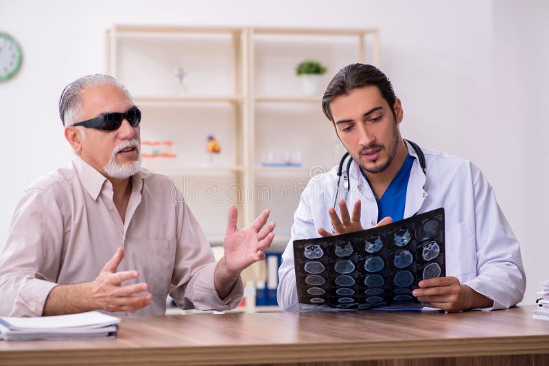 Old Blind Man Visiting Young Male Doctor Stock Image - Image of ...