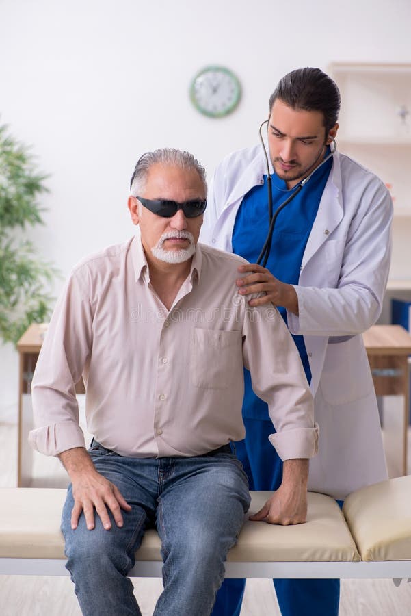 Old Blind Man Visiting Young Male Doctor Stock Image - Image of ...